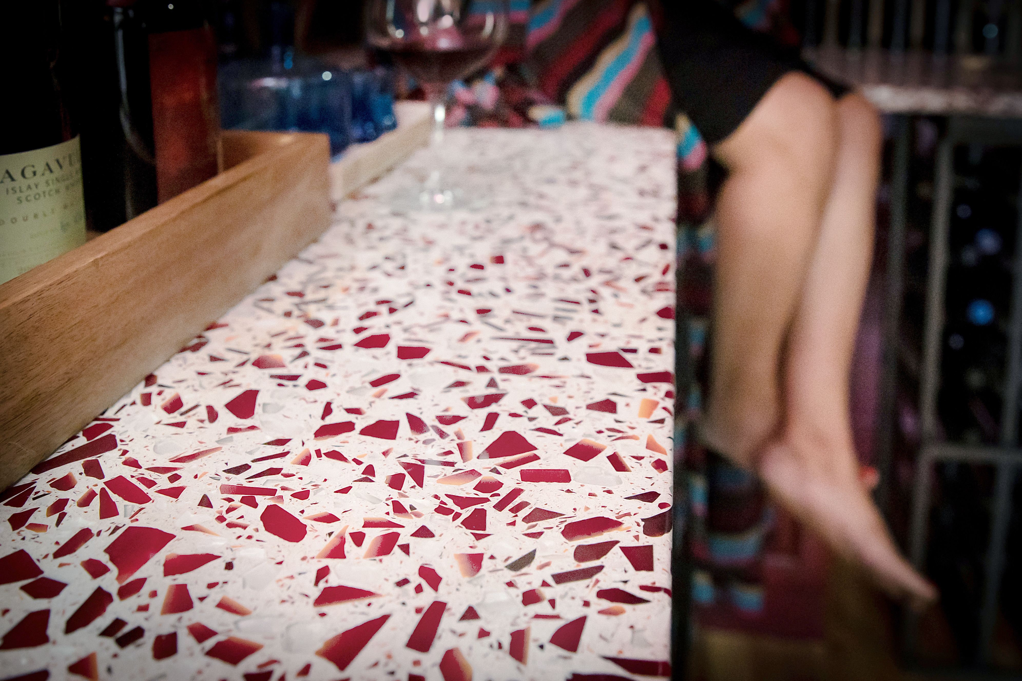 Vetrazzo's Ruby Red Countertops Inspire A Luxe Wine Room Design